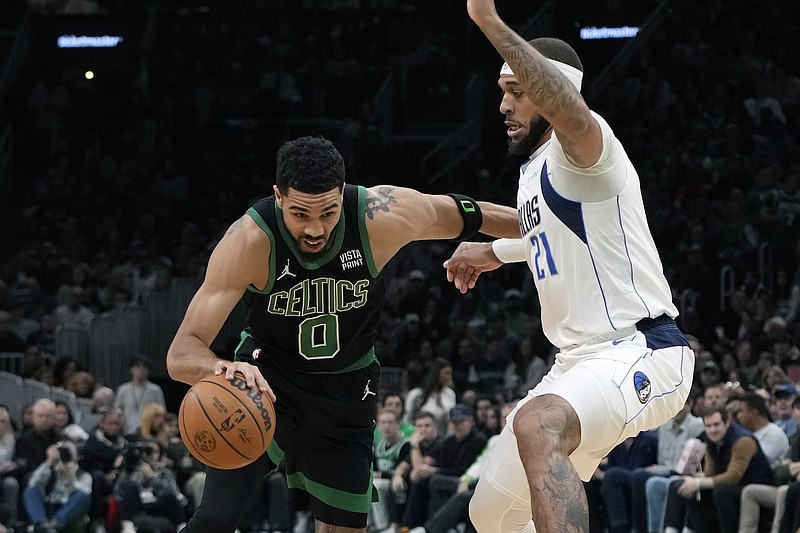 Celtics overcome Doncic's triple-double to beat Mavericks 138-110 for 10th straight win ...