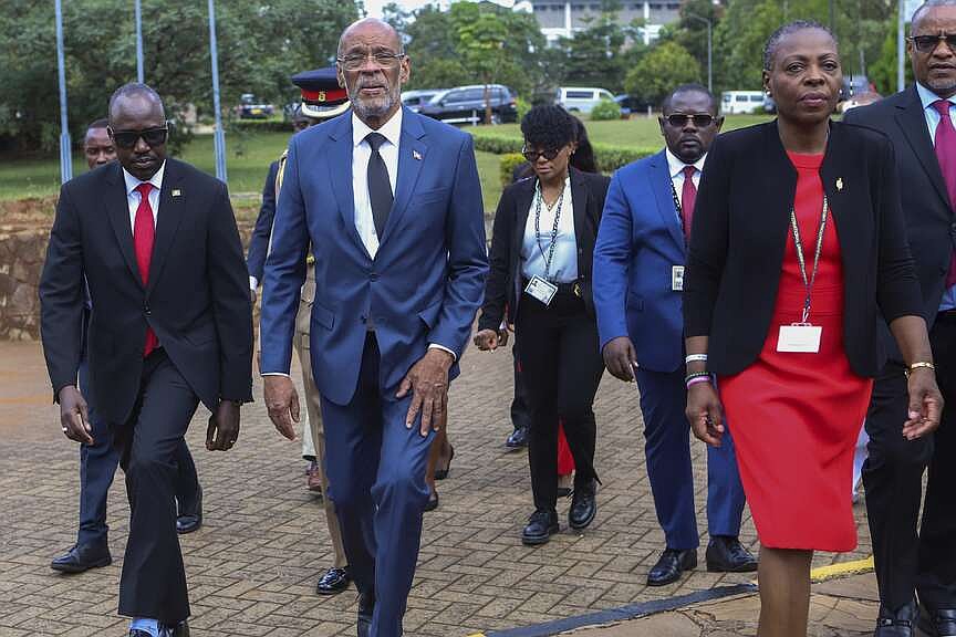 Haiti orders a curfew after gangs overrun its two largest prisons ...