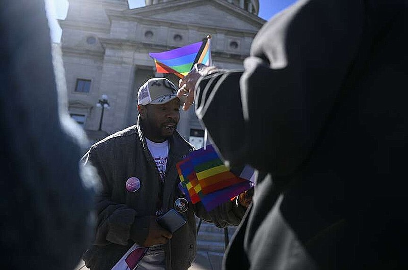 Protesters at state Capitol decry loss of gender neutral option on ...