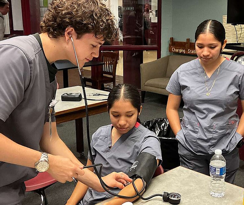CNA/PCA class conducts health fair at Gentry High School | Westside ...