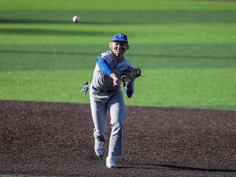 Junior baseball standout Lawing moves position in order to aid Rogers ...