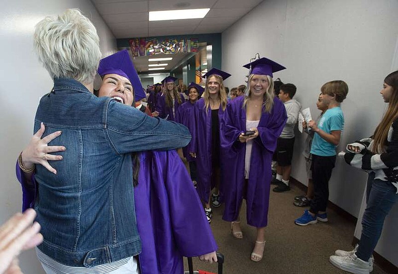 PHOTOS: Fayetteville seniors honored in visits to their former schools ...