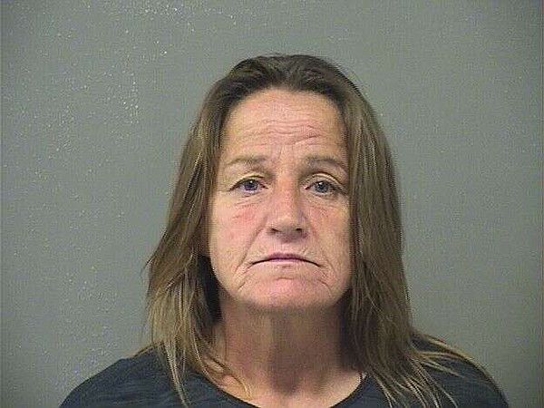 Woman arrested after allegedly attacking her son’s adoptive father ...