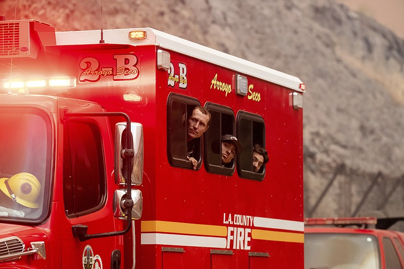 Firefighters helped by cooler weather battle blaze that has scorched ...