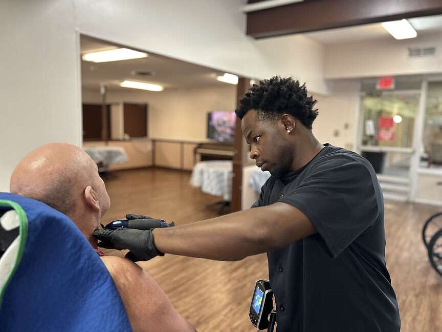 PHOTO | Tonsorial Arts Barber College students care for nursing home ...