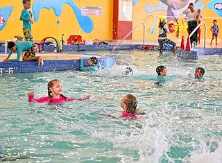 Springdale kids take break from school, hit pool for swimming test as ...