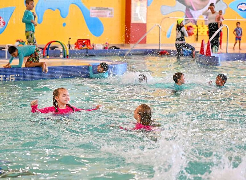 Springdale kids take break from school, hit pool for swimming test as ...
