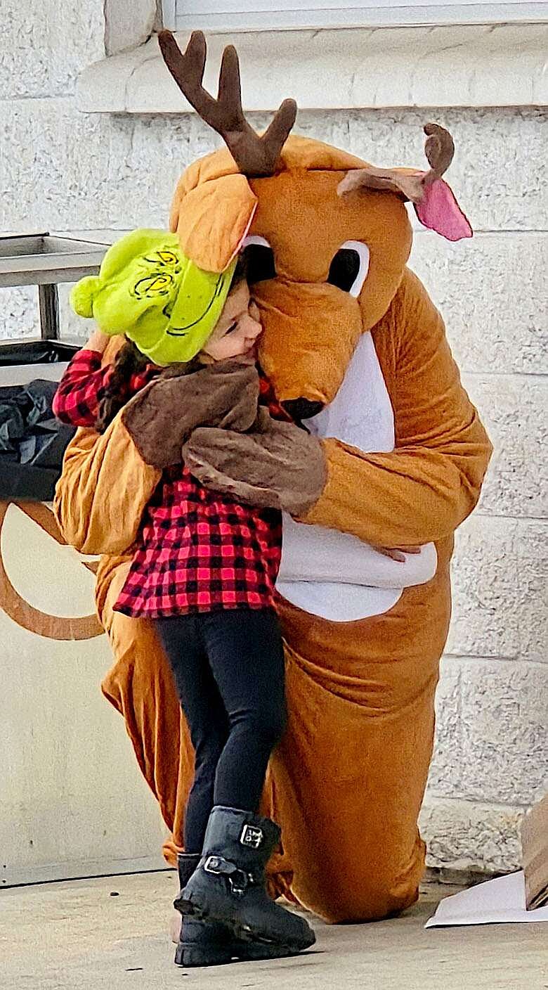 Getting a reindeer hug | Westside Eagle Observer