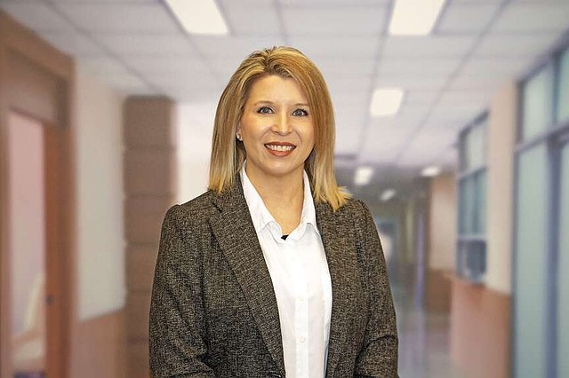 Bohannan makes history as first female layperson president of CHI St ...