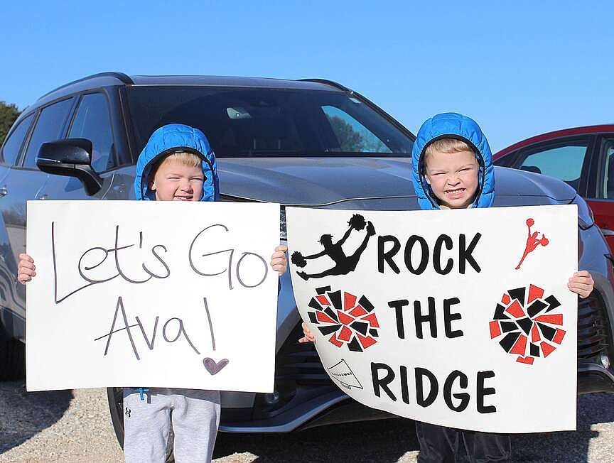 Cousin cheering! | Pea Ridge Times