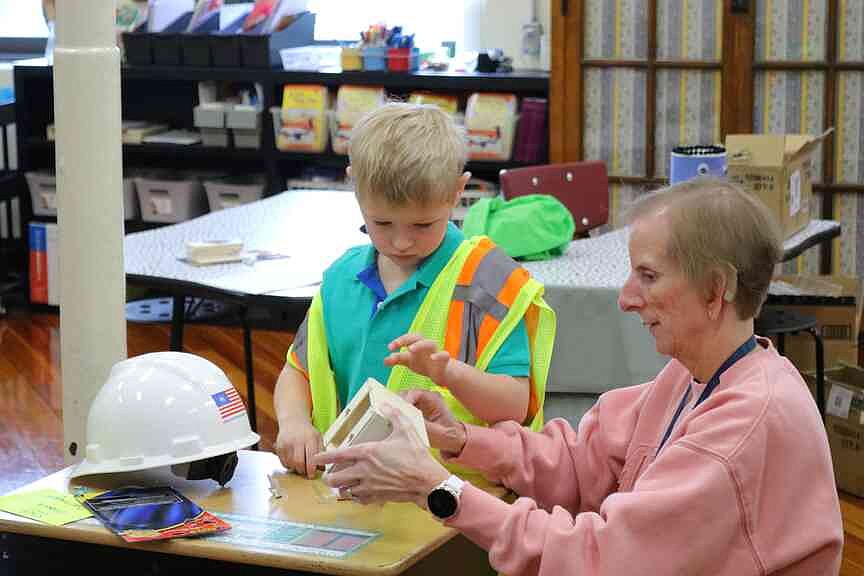 St. Peter students try making birdhouses, slime in Catholic Schools ...
