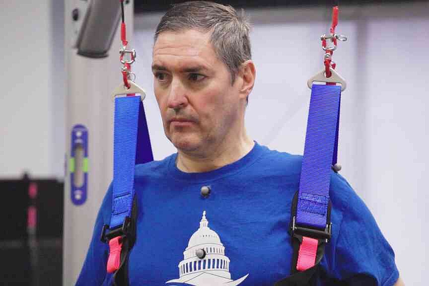 Spine-zapping implant helps people with muscle-wasting disease walk ...