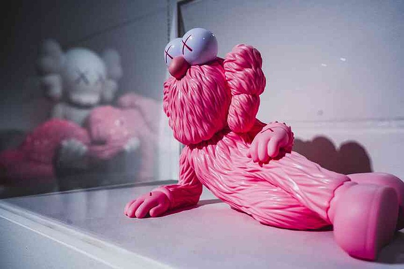 Artist known as KAWS brings whimsical work to Crystal Bridges | River ...