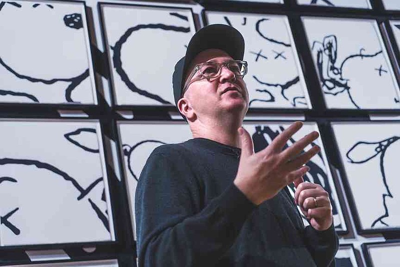 Artist known as KAWS brings whimsical work to Crystal Bridges ...