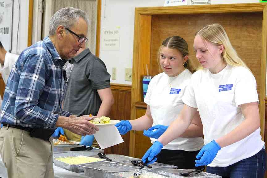 Volunteers celebrate veterans at Operation Bugle Boy's annual get ...