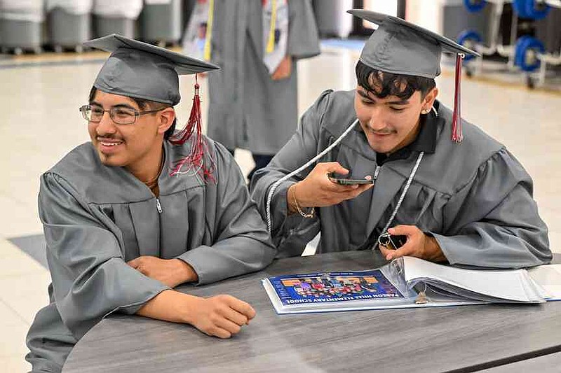 PHOTOS: Graduating seniors return to their elementary schools in ...