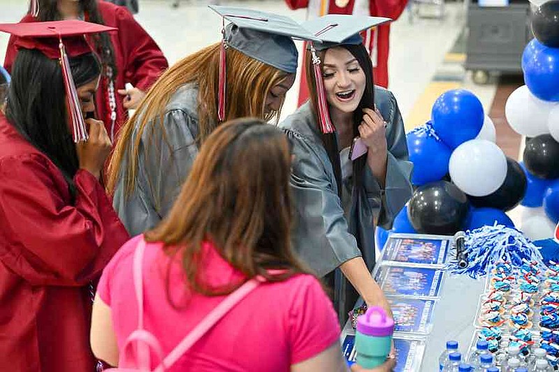 PHOTOS: Graduating seniors return to their elementary schools in ...
