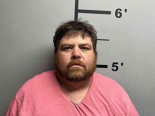 Lincoln man held on $100,000 bond after being accused of running over a ...