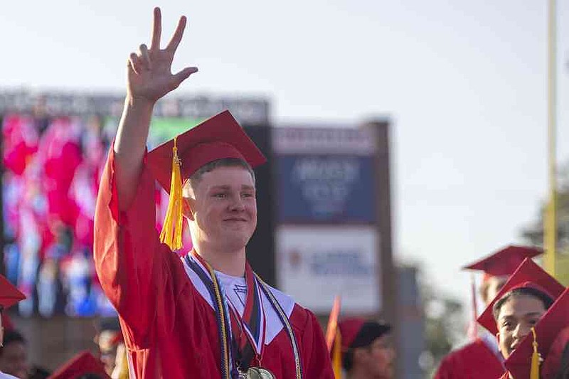 Turning tassels | River Valley Democrat-Gazette