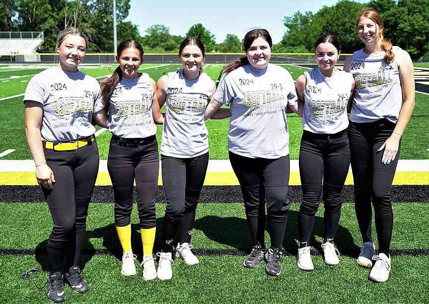 Hackett senior softball players enjoying last ride to championship game ...