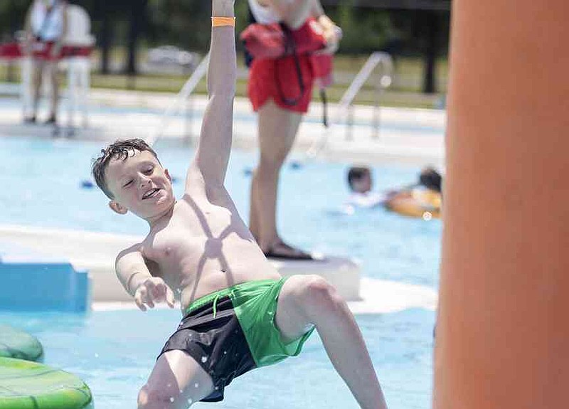 Area pools open for Memorial Day; Parrot Island boasts new attractions ...