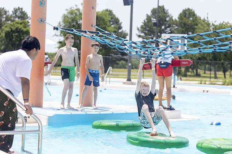 Area pools open for Memorial Day; Parrot Island boasts new attractions ...
