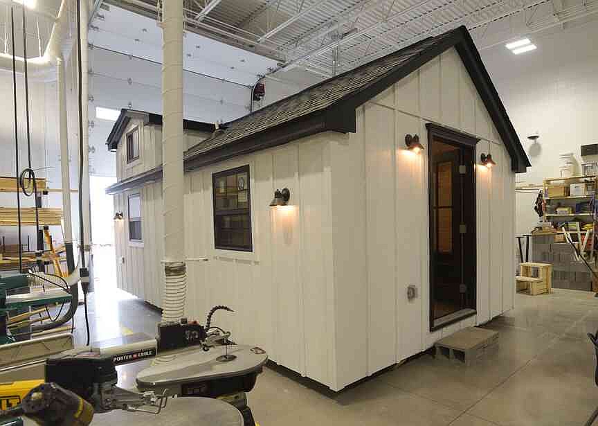 Going once, going twice, sold: Rogers School District auctions off student-built tiny home ...