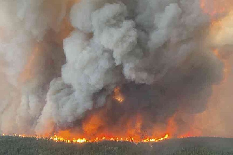 17,000 Canadians forced to flee Manitoba wildfires | The Arkansas ...