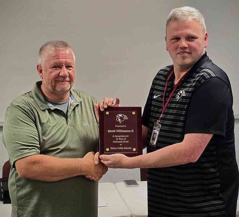 School board honors teachers, staff, approves computer purchase, bus ...