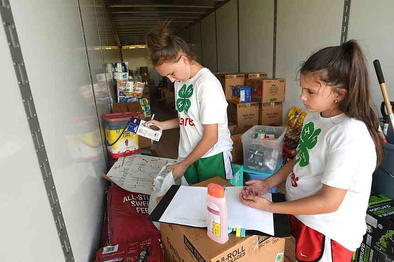 PHOTOS: Family gathers donations for those affected by Texas flooding | The Arkansas Democrat ...