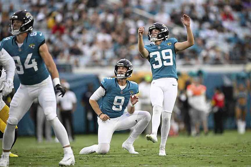 Jaguars celebrate Little’s 70-yarder | The Arkansas Democrat-Gazette ...