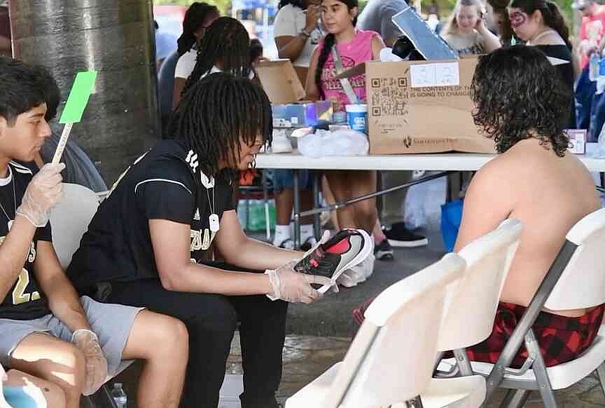 WATCH | Trojan student-athletes give back through service at Samaritan ...