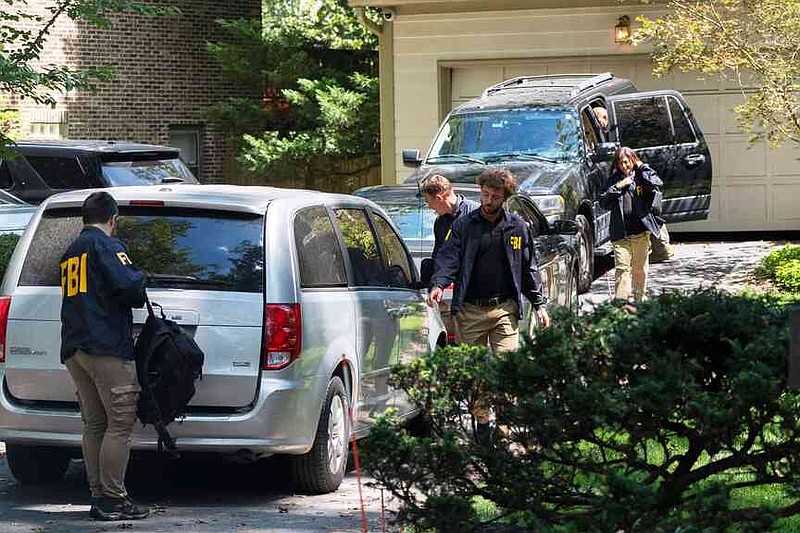 FBI searches home and office of ex-Trump national security adviser John ...