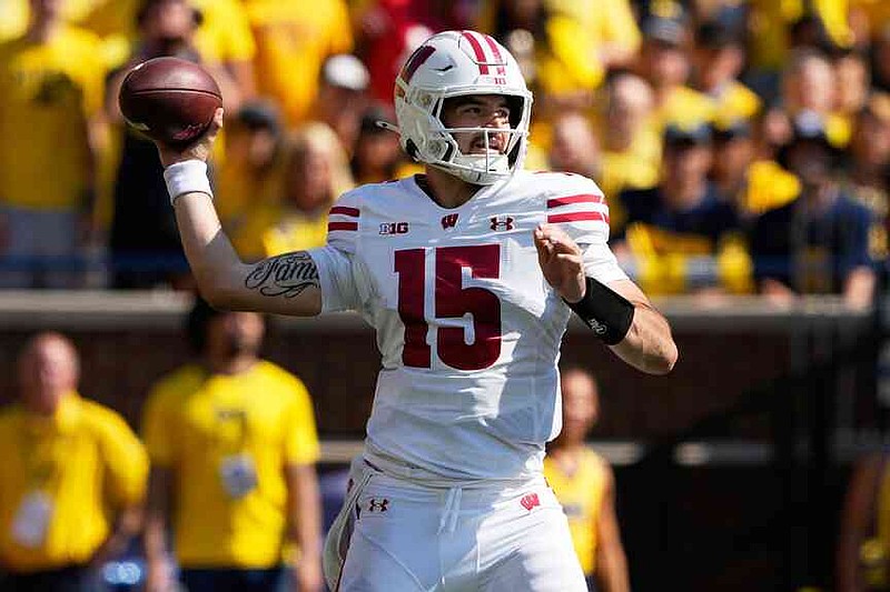 Wolverines clamp down after opening drive | The Arkansas Democrat ...