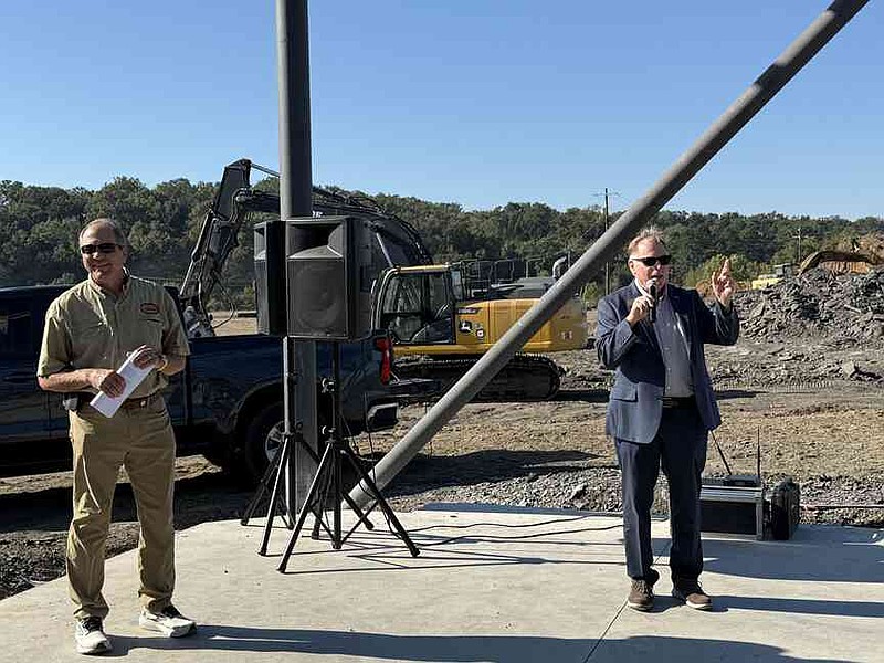 Final beam of new Scott-Sebastian County Library lifted into place ...