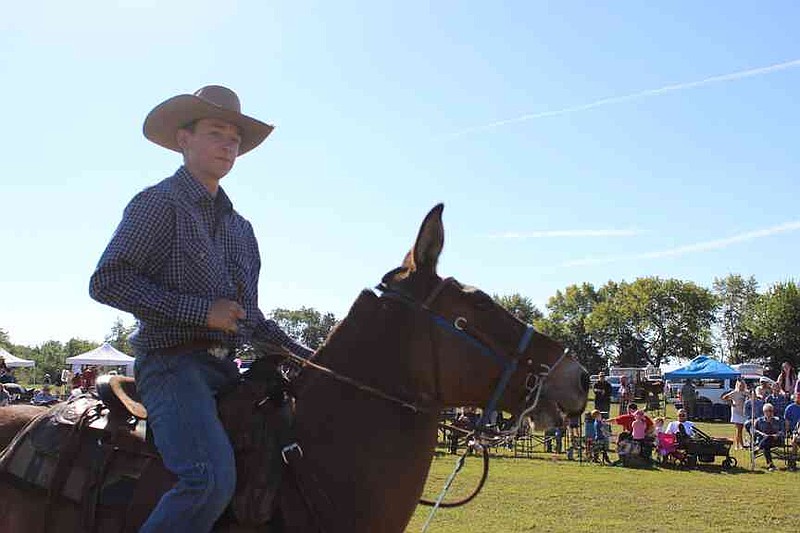 Weaving through poles quickly wins the prize | Pea Ridge Times