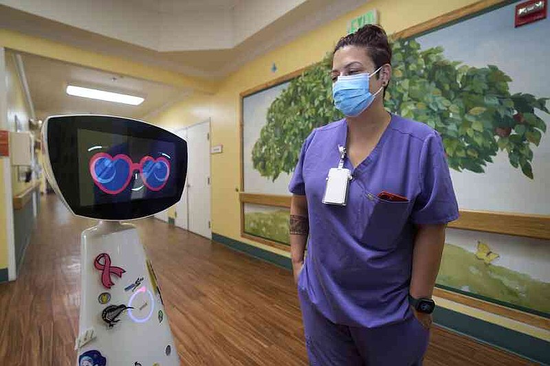 Therapeutic robot used to combat patient loneliness | The Arkansas ...