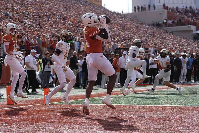 Horns’ Manning comes out firing | The Arkansas Democrat-Gazette ...