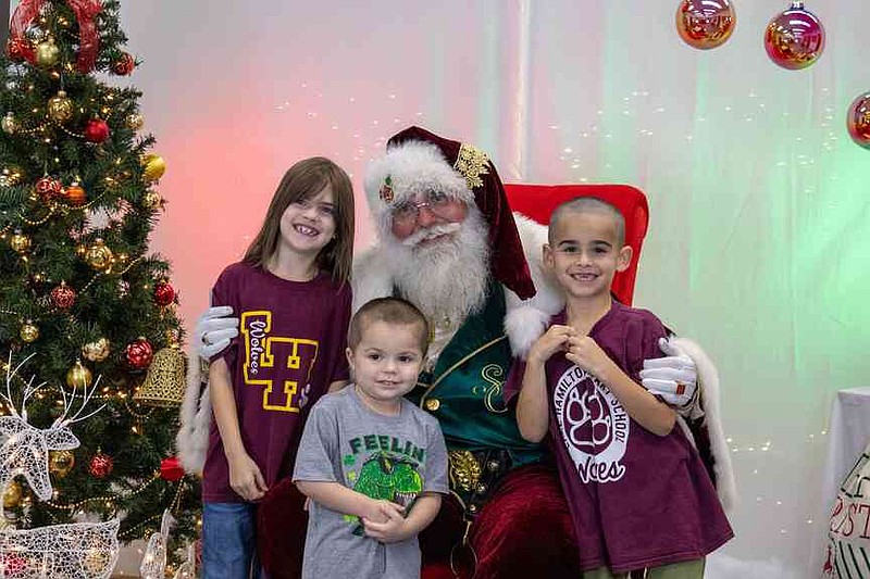 WATCH | Santa Claus brings holiday cheer to The Sentinel-Record | Hot ...