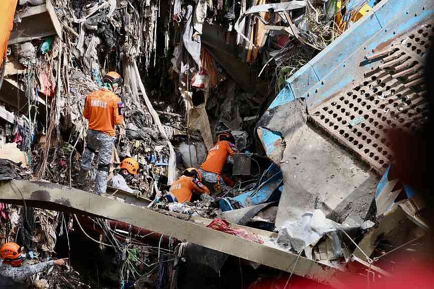 Filipino rescuers detect ‘signs of life’ in garbage avalanche that ...