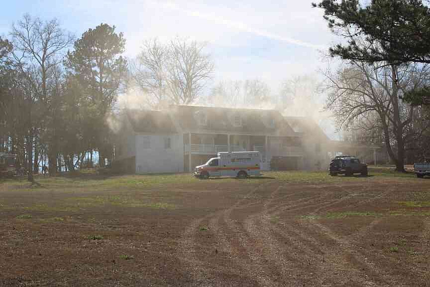 Fire departments work together to extinguish house fire off Albert Pike ...