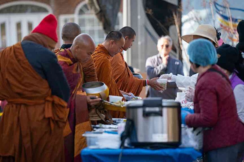 Buddhist monks, dog captivate US | Northwest Arkansas Democrat-Gazette