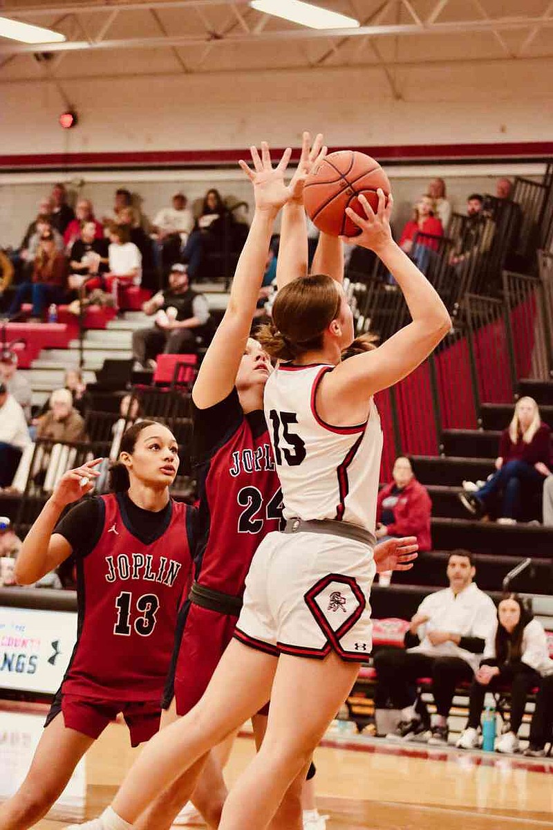 PHOTOS: Lady Mustangs stomp Eagles | The McDonald County Press