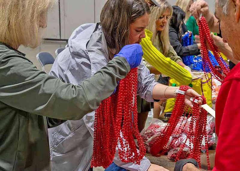 WATCH | ‘A lot of fun’: George Dooley helps prepare beads for annual ...
