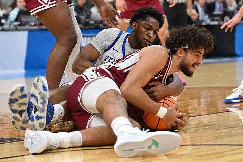 Buzzer-beater saves ’Cats from early exit | The Arkansas Democrat ...