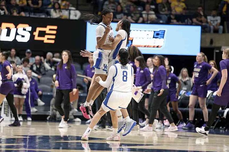Kentucky players react in the first half against James Madison in the ...