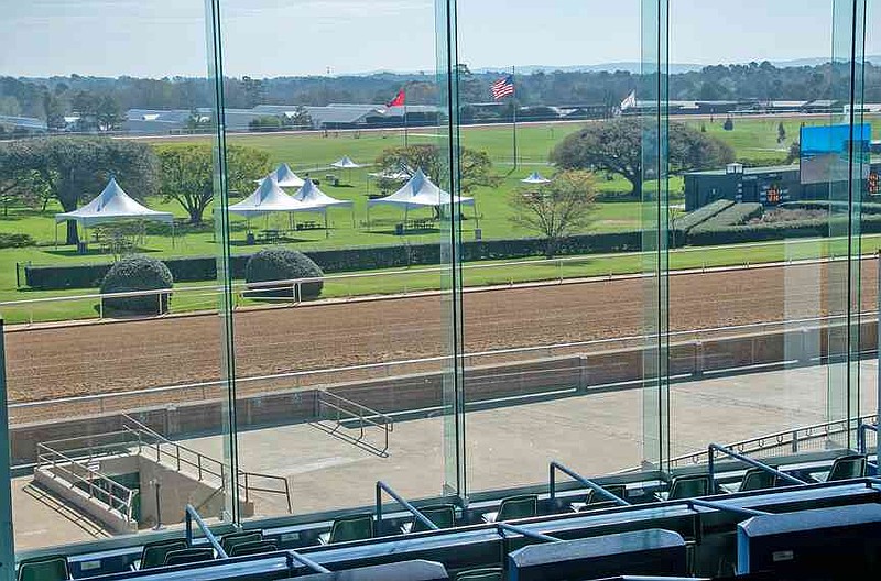 Canopies on the infield at Oaklawn can be seen from the infield earlier ...