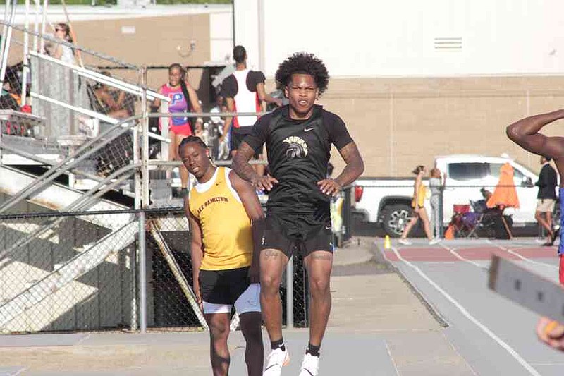 Trojan track teams take detour south in preps for conference | Hot ...
