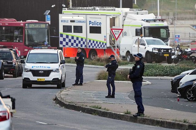 FILE - Police patrol in the early morning at Sydney's Bondi Beach, Dec ...