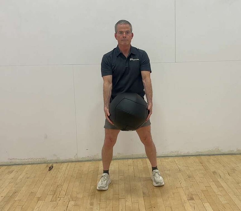 In this second of three photos, Jay Lloyd, personal trainer with the ...